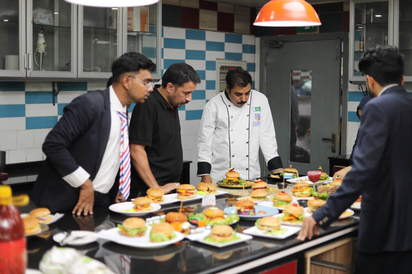 Record 1400 burgers made in a day as Chefs Association of Pakistan ...